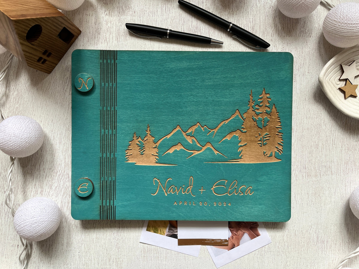 Personalized wedding guest book with mountains and pine trees, our adv ...